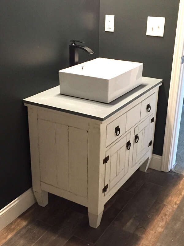 Osborne Wood | Custom Vanity features Osborne Dining Table Legs