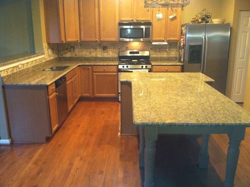 Osborne Wood | Kitchen Island Supported by Island Posts & Custom Skirt